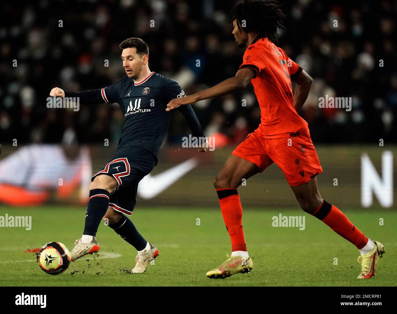 PSG's Lionel Messi, left, duels for the ball with Nice's Khephren ...