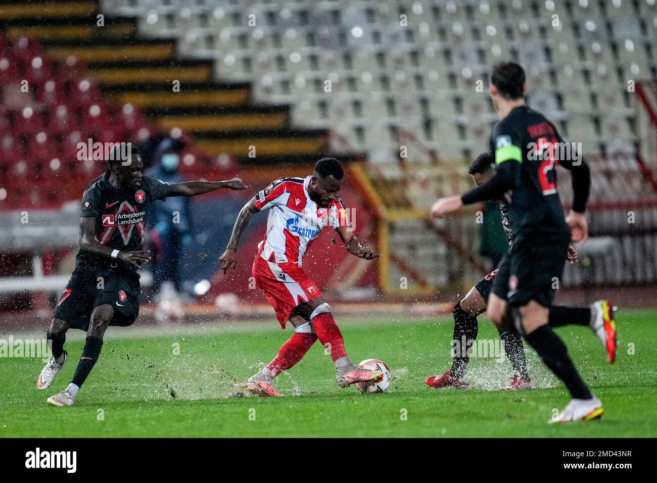 Red Star's Guelor Kanga, center, controls the ball during the Europa ...