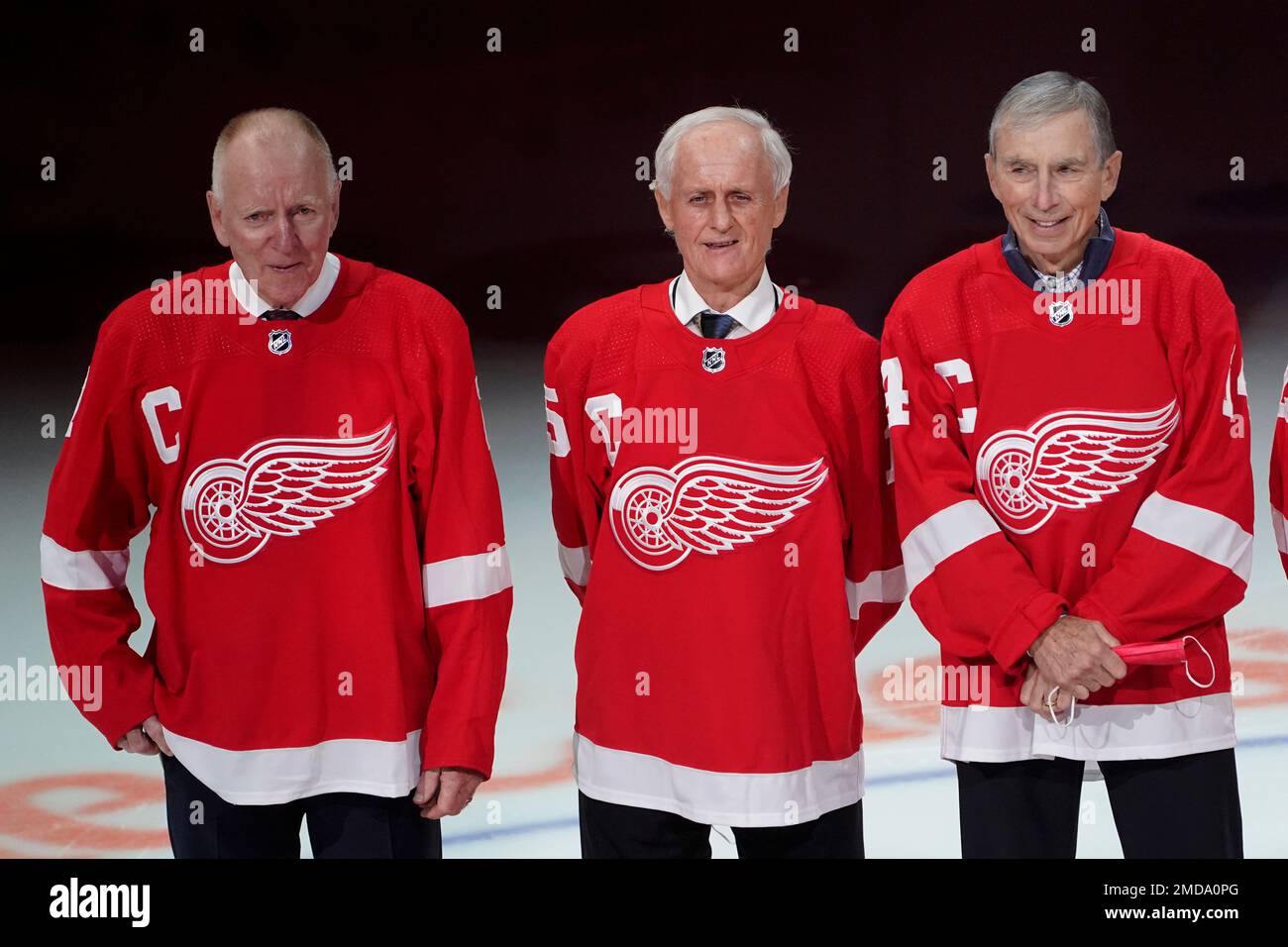 Former Detroit Red Wings captains Red Berenson, from left, Paul Woods ...