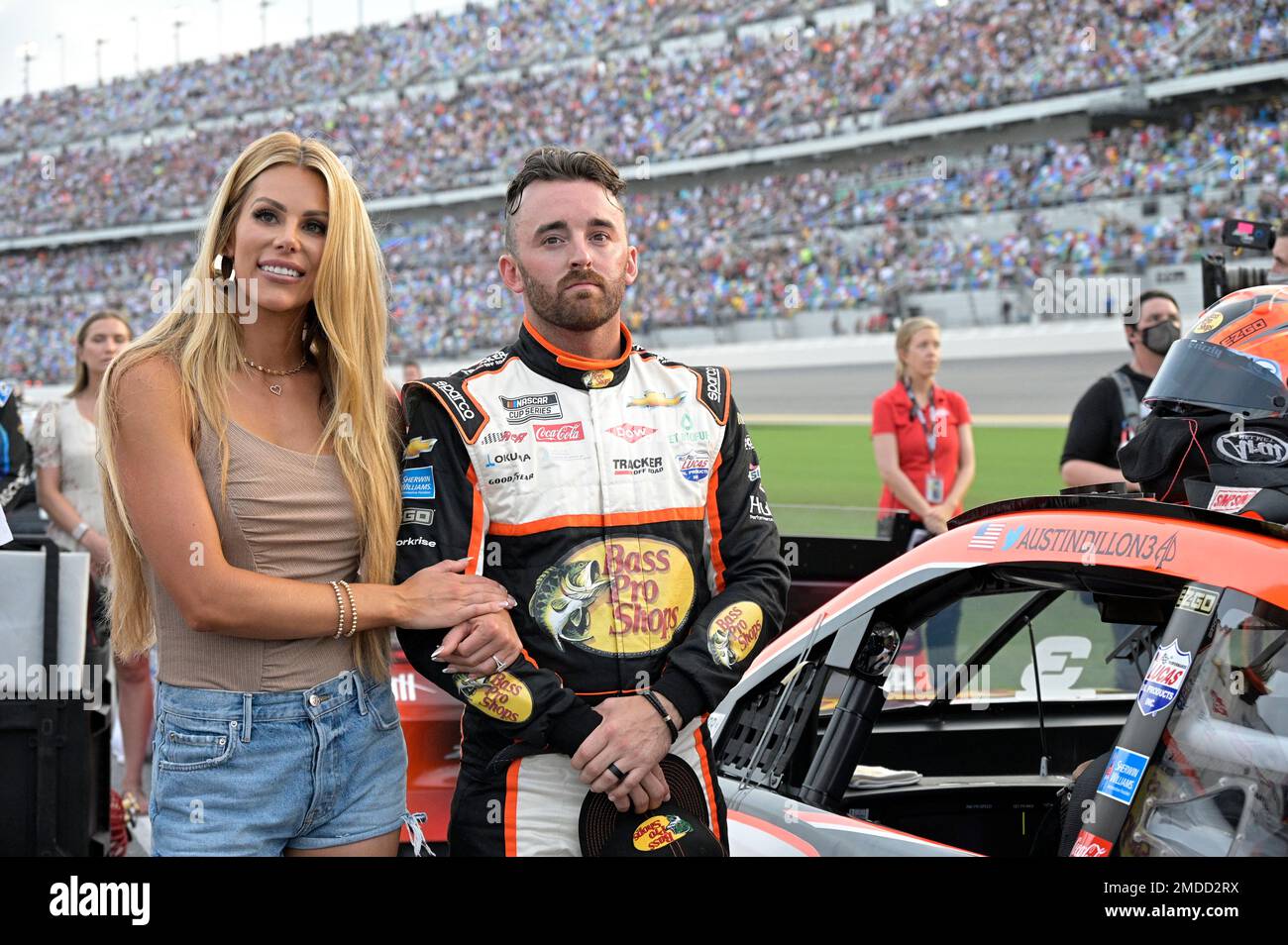 Austin Dillon stands next to his vehicle with his wife Whitney Dillon ...