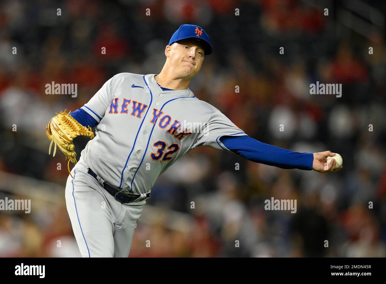 New York Mets relief pitcher Aaron Loup (32) throws to first during a ...