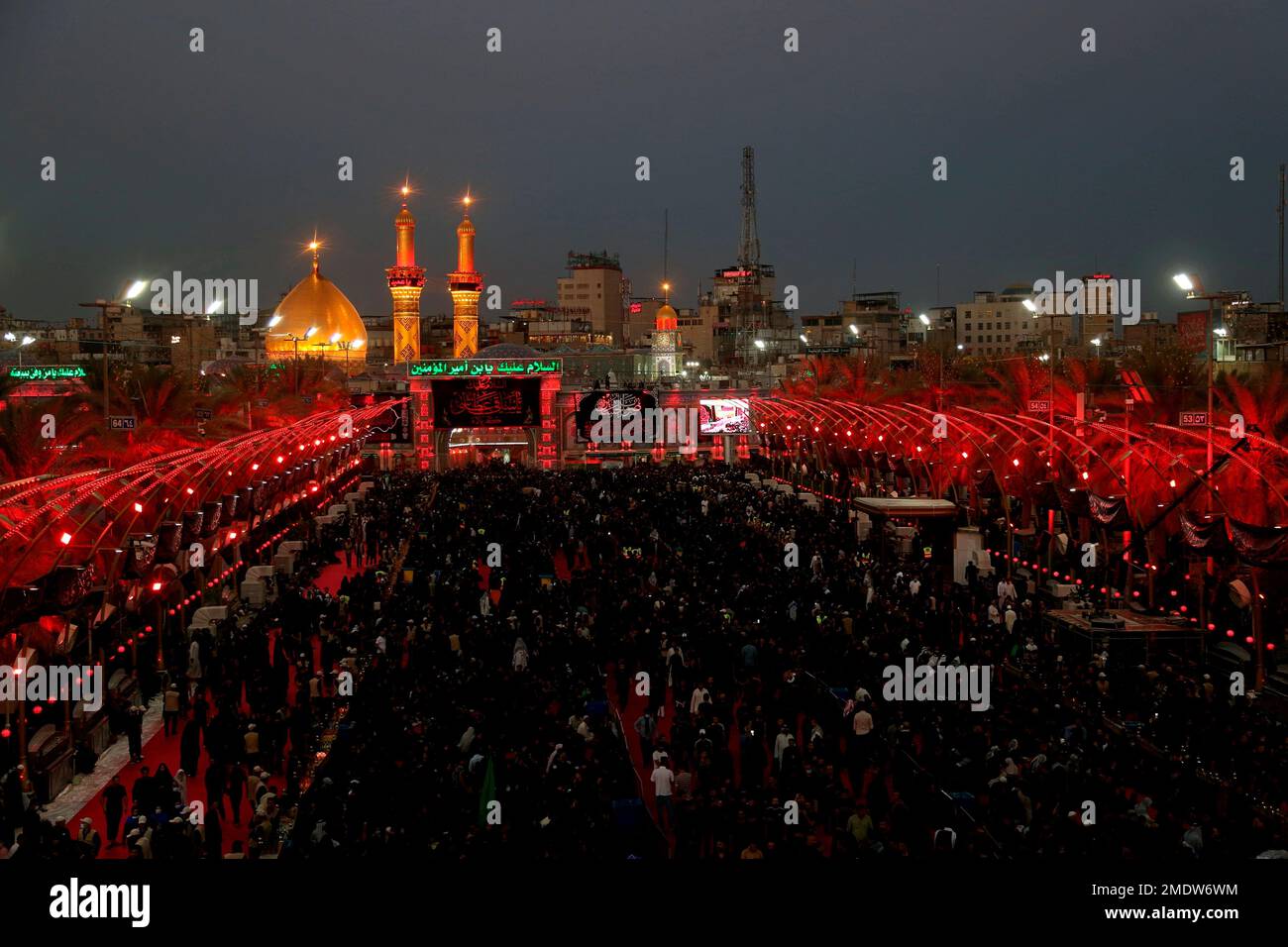 Shiite Muslim worshippers gather around the shrine of Imam Abbas during ...