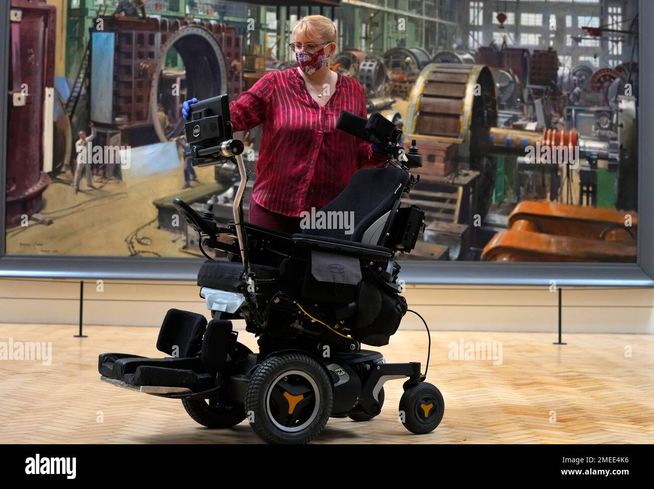 Kate Perks, Senior Collections Care Conservator stands with the ...