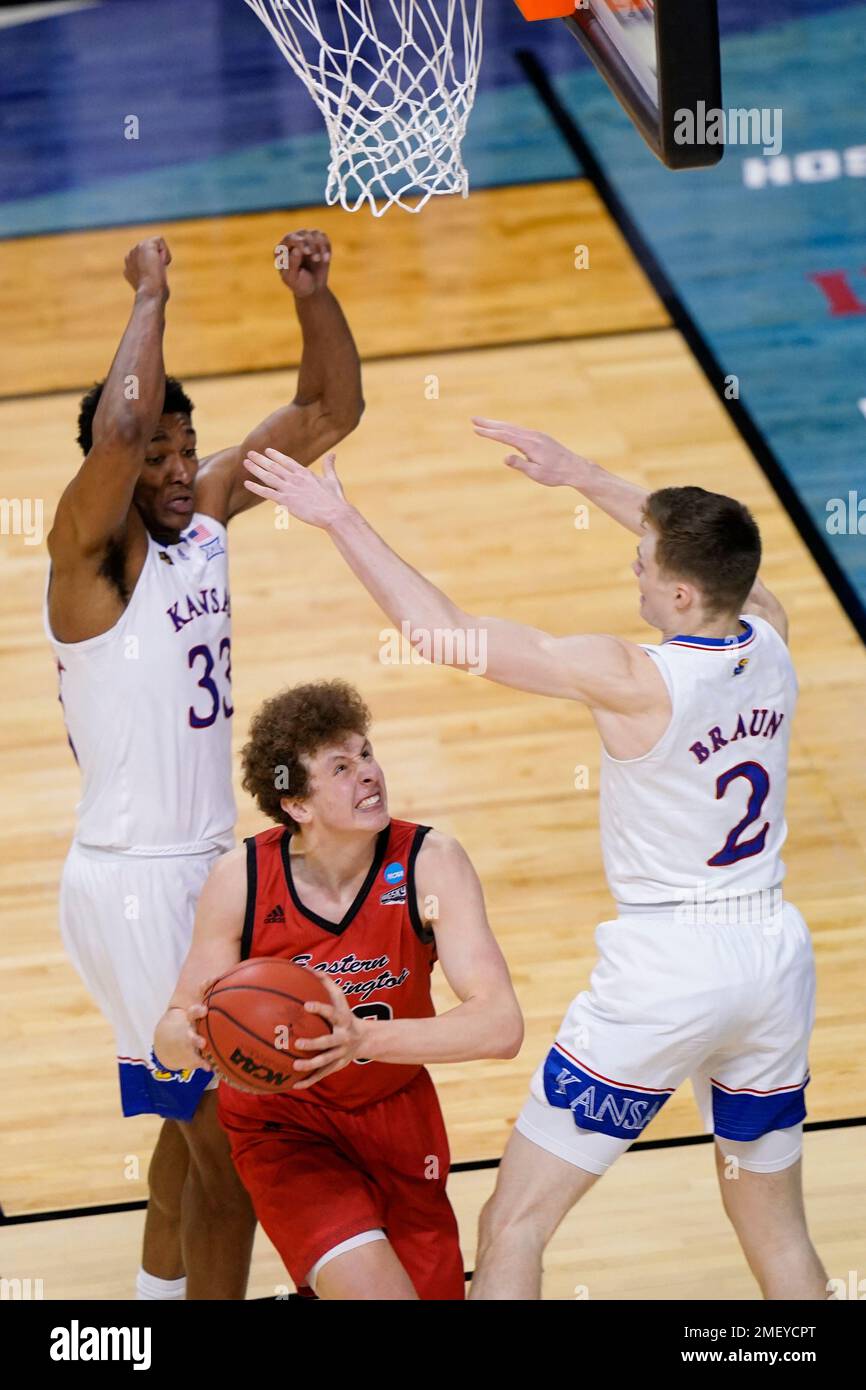Eastern Washington guard Jacob Groves (33) is pressured by Kansas ...