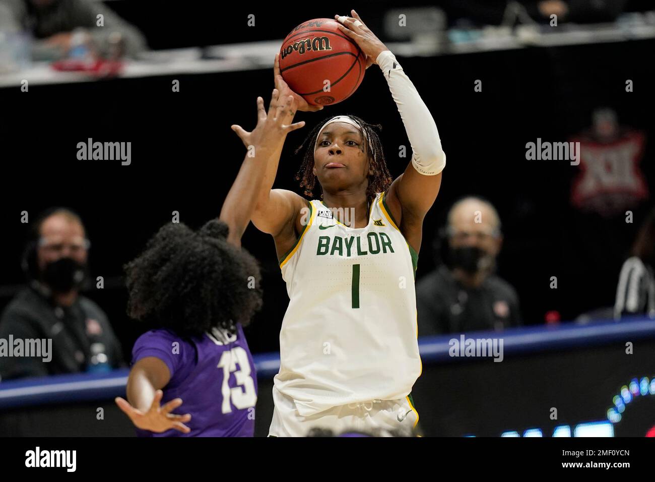 Baylor forward NaLyssa Smith (1) shoots over TCU guard Tavy Diggs (13 ...