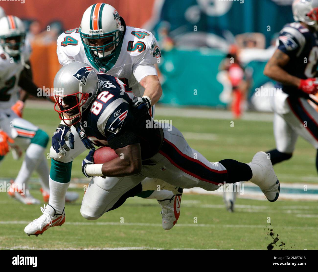 FILE - New England Patriots tight end Daniel Graham (82) is stopped by ...