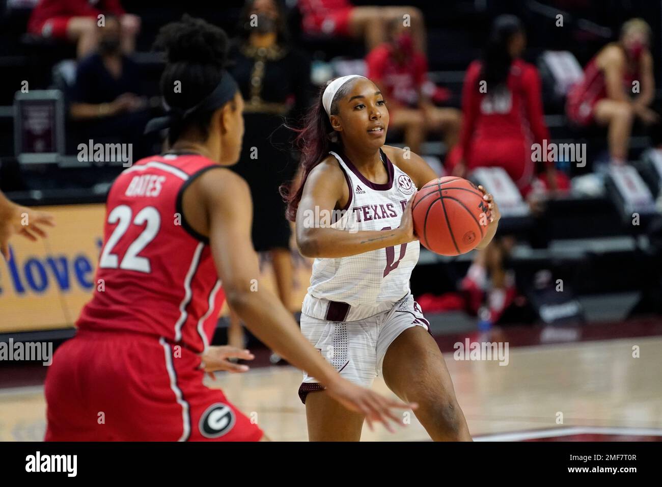 Texas A&M guard Kayla Wells (11) passes the ball against Georgia ...