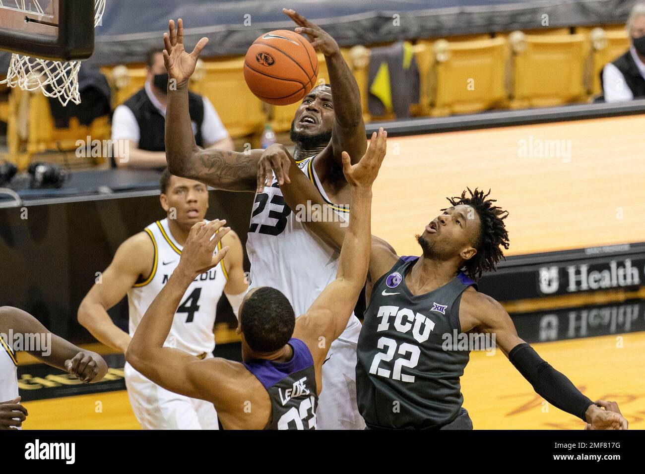 Missouri's Jeremiah Tilmon, top, pulls down a rebound over TCU's RJ ...