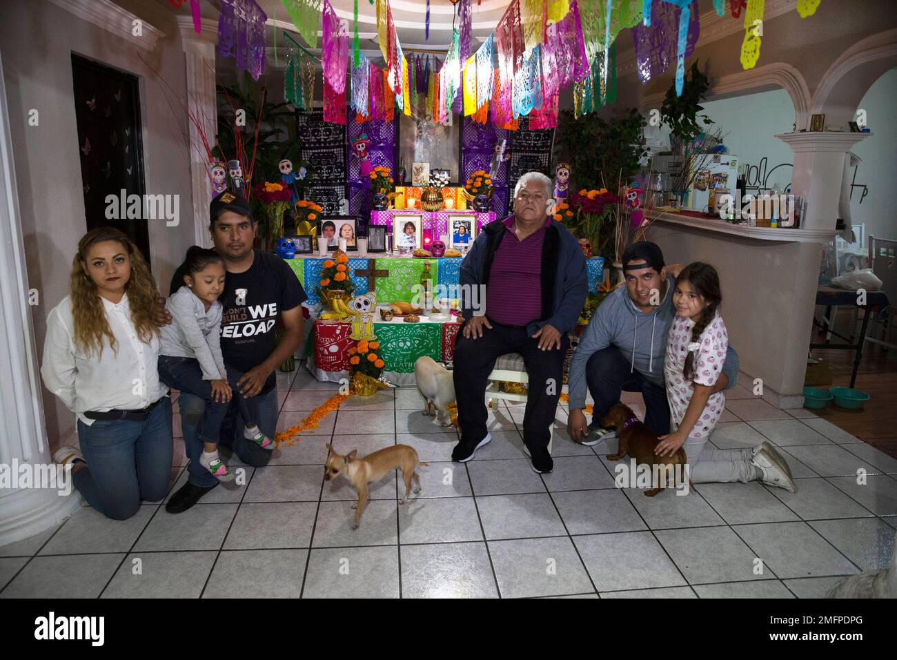 Salvador Cervantes Torres, center, a recovered COVID-19 patient, and ...