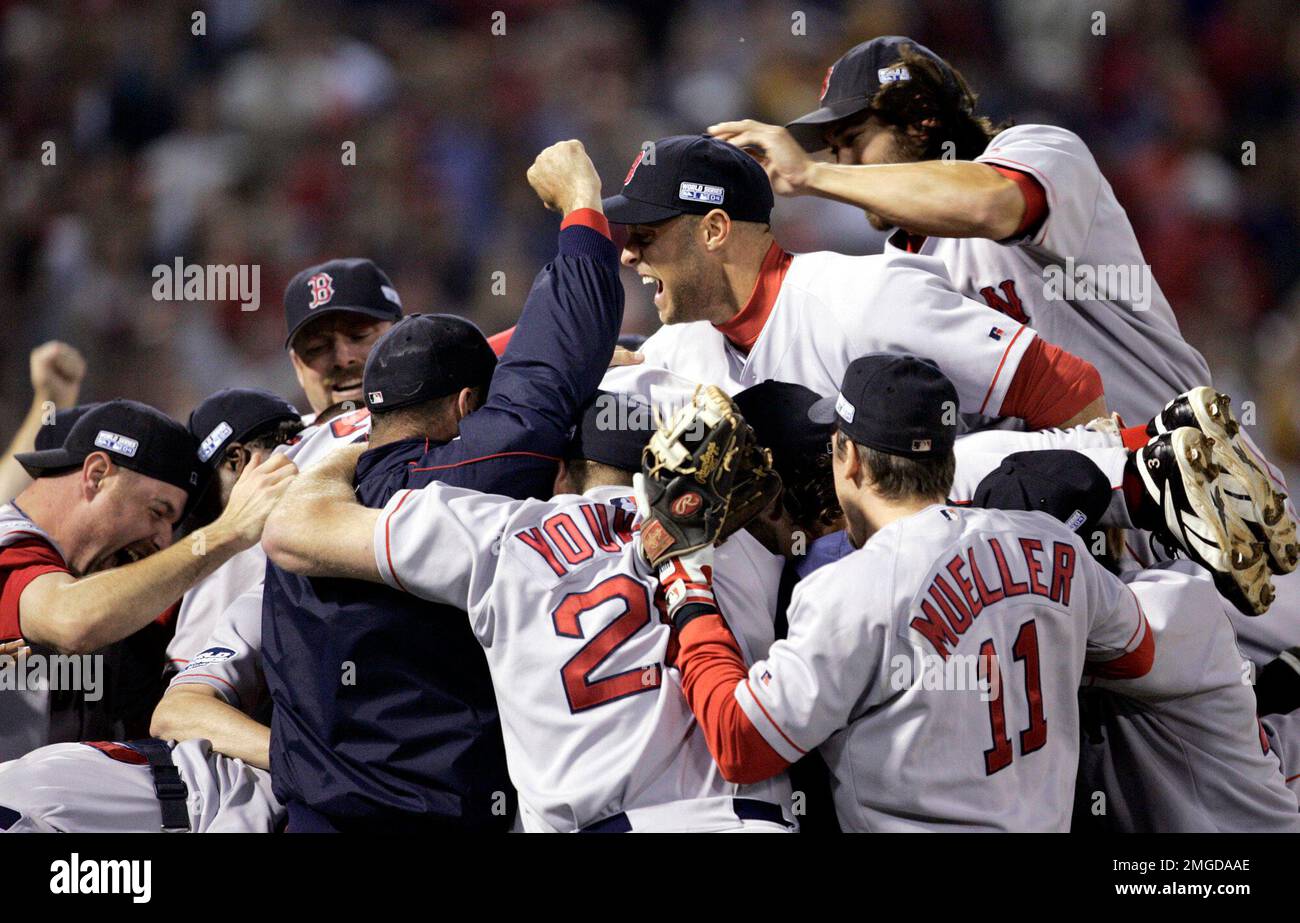 FILE - In this Oct. 27, 2004, file photo, Boston Red Sox players ...