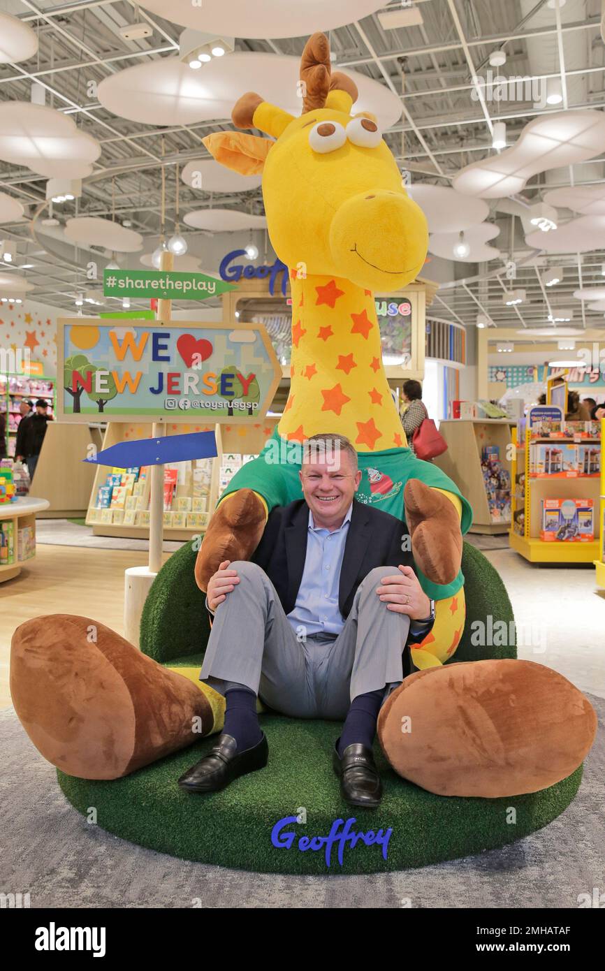 Richard Barry, CEO of Toys R Us, poses for a picture with the Toys R Us ...