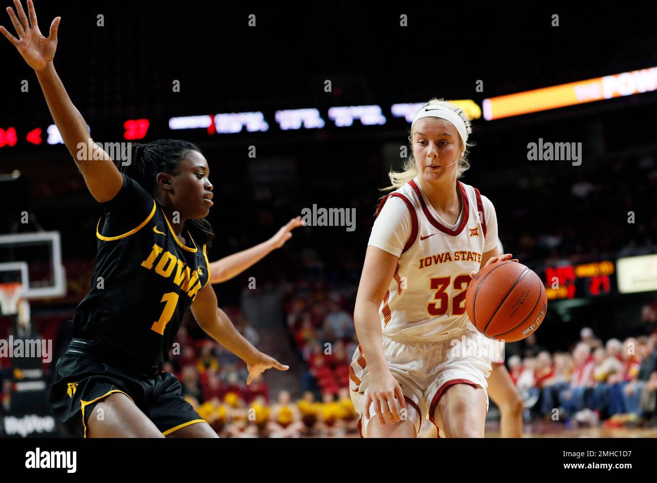 Iowa State guard Maggie Espenmiller-McGraw drives past Iowa guard Tomi ...