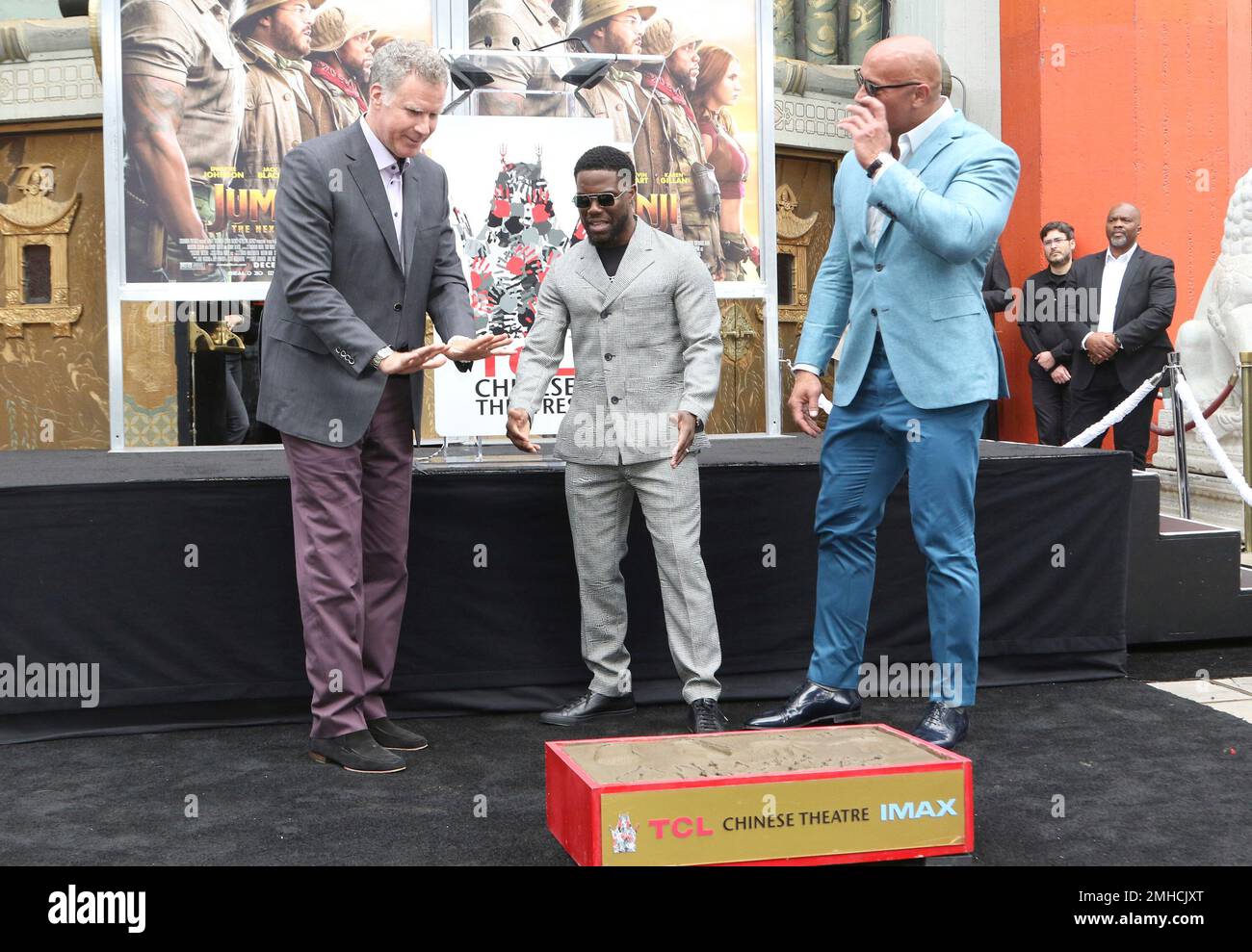 Will Ferrell, from left, Kevin Hart and Dwayne Johnson appear during a ...