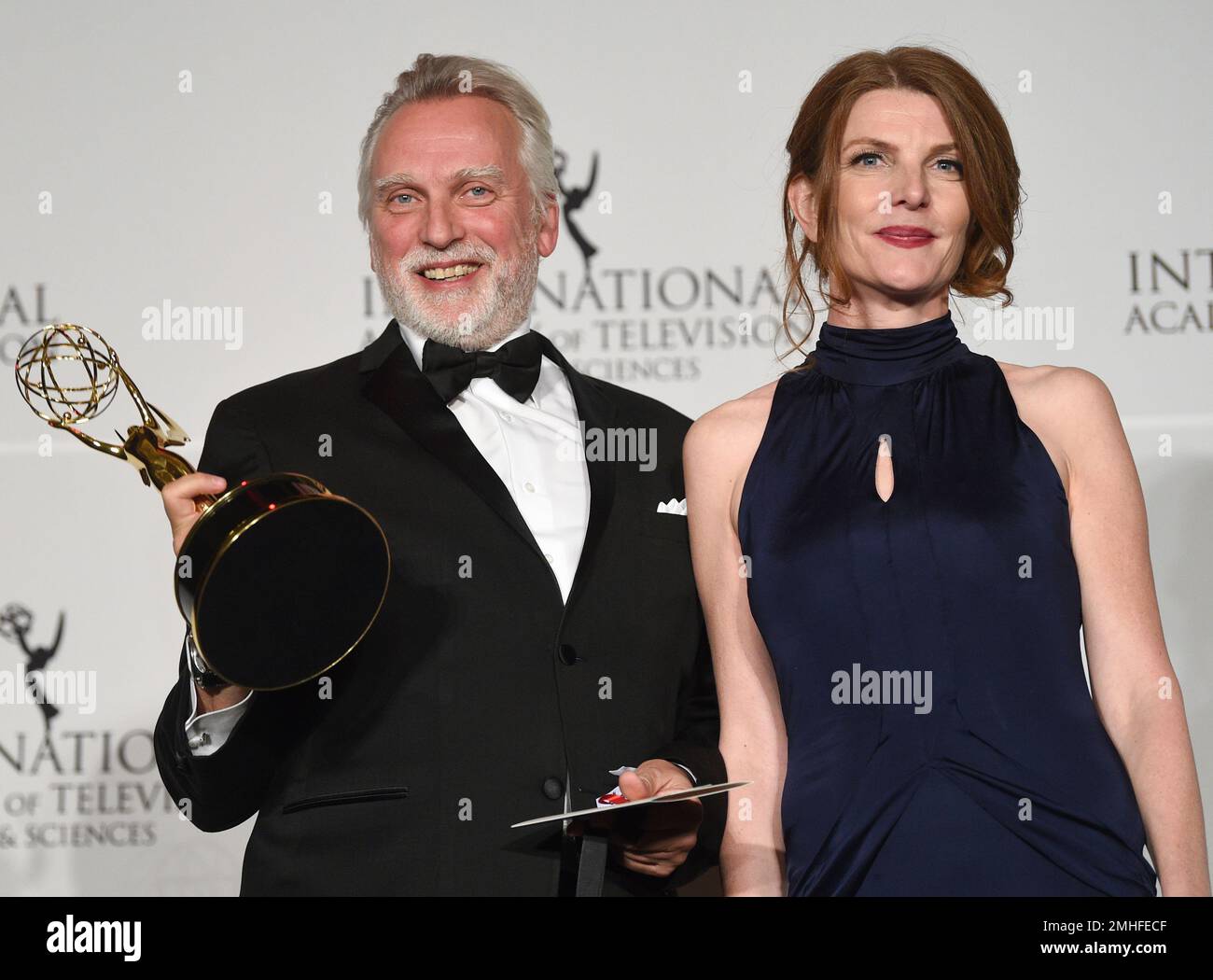Director Hans Pool, left, and producer Femke Wolting pose with the best documentary award for ...