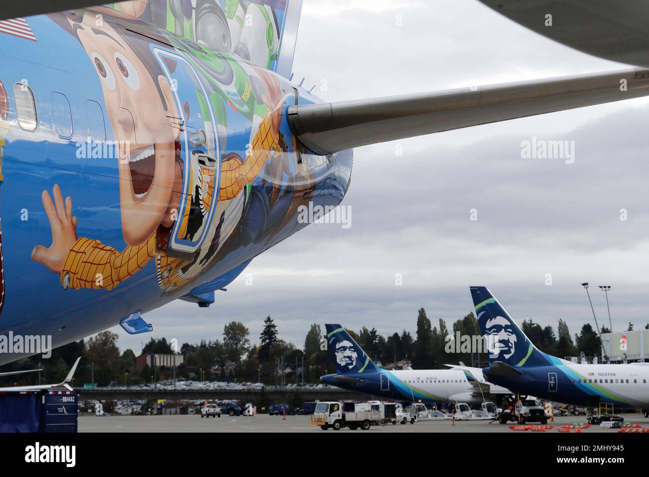 The tail of an Alaska Airlines Boeing 737-800 with a newly painted ...
