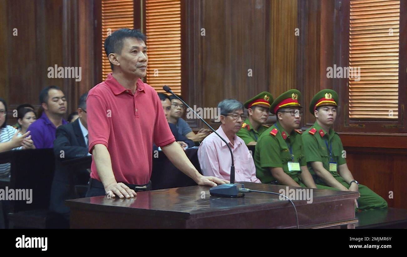 Michael Nguyen stands during his trial, Monday, June 24, 2019, in Ho Chin Minh City, Vietnam ...