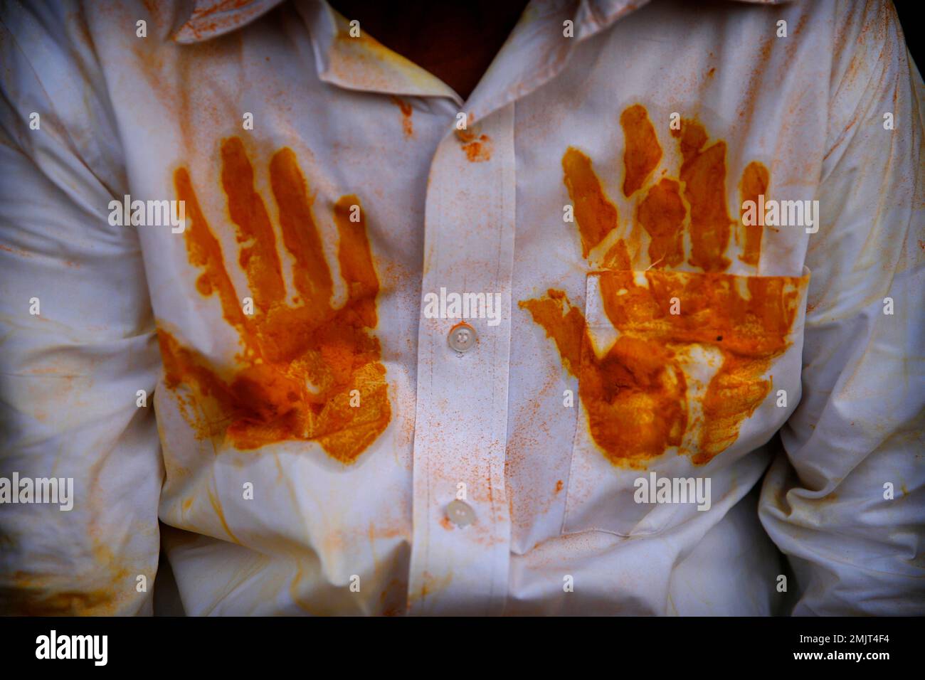 In this Monday, June 3, 2019, photo, a devotee's shirt has handprints ...