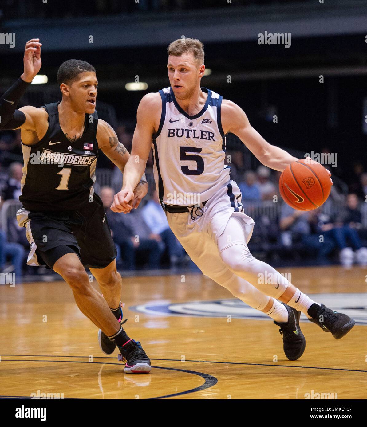 Butler guard Paul Jorgensen (5) drives the ball around the defense of ...