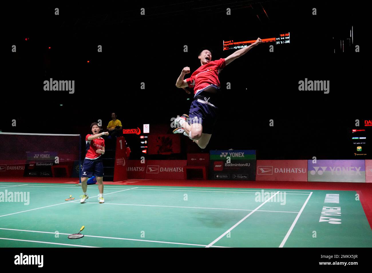 China's Feng Yan Zhe, right, and Huang Dong Ping celebrate after ...