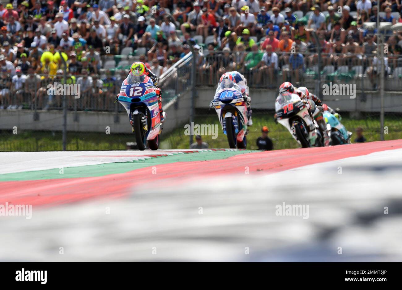 Italian rider Marco Bezzecchi of the Redox PruestelGP, left, steers his ...