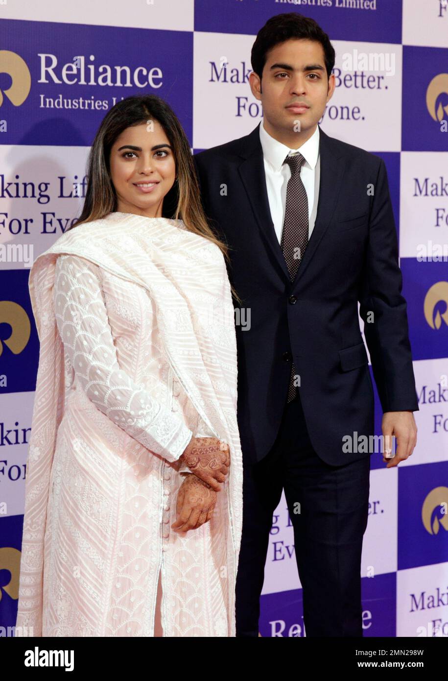 Akash Ambani, right, and Isha Ambani, children of Reliance Industries Limited (RIL) Chairman ...
