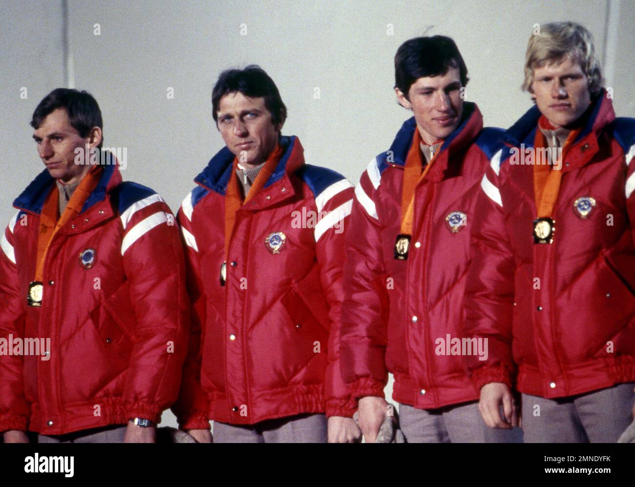 The 4 x 7.5km relay team for the Soviet Union stand on the podium after ...