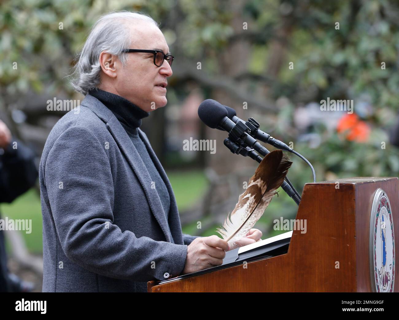 Artist, Alan Michelson, speaks at the dedication of the Mantle a ...