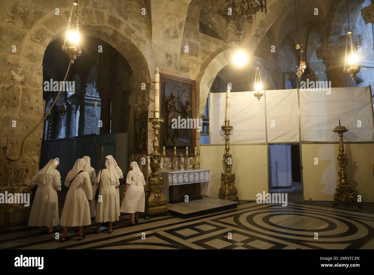 In this Thursday, Oct. 27, 2016 photo, Christian nuns walk next to the ...