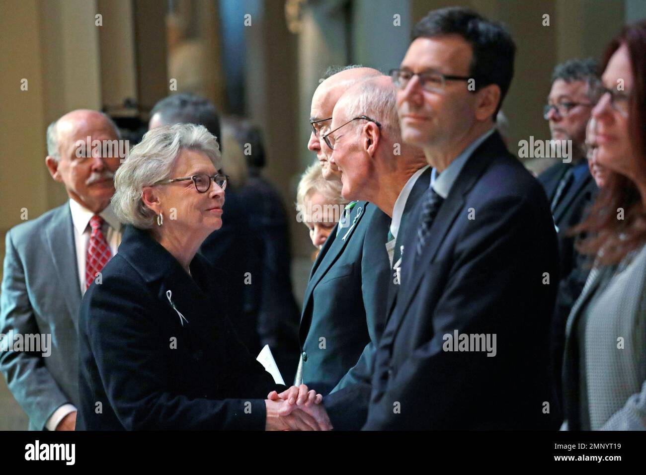 Former Washington Gov. Chris Gregoire, second left, greets former Sen ...