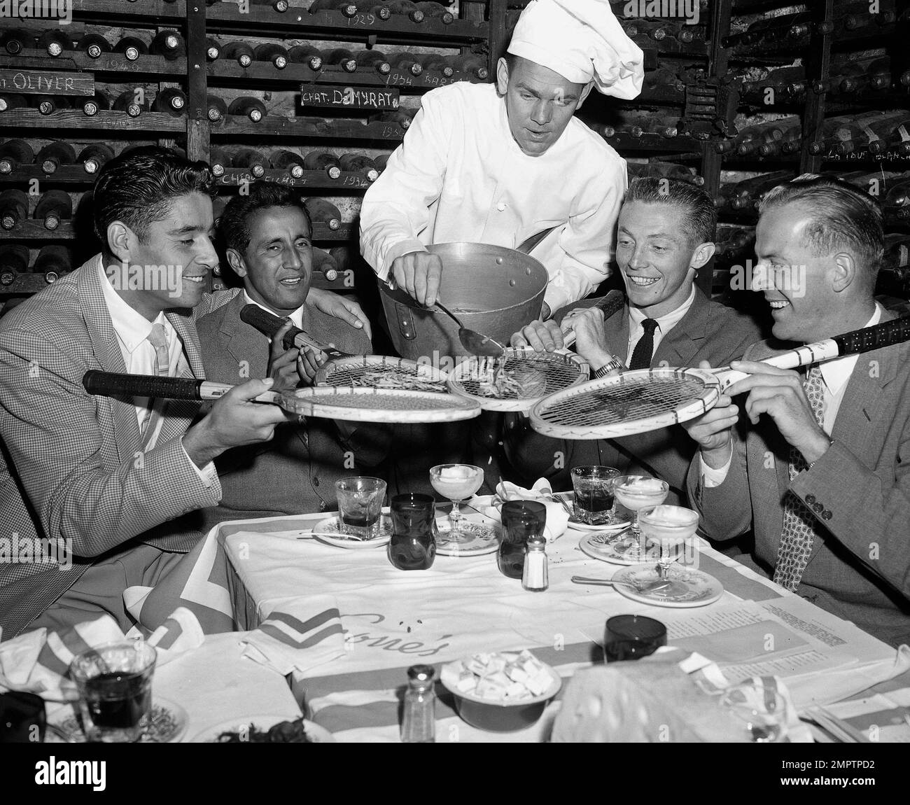 FILE - In this Dec. 6, 1955, file photo, promoter Jack Kramer does the ...