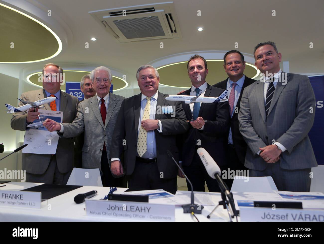 From left to right, Barry Biffle, chief executive officer of Frontier ...