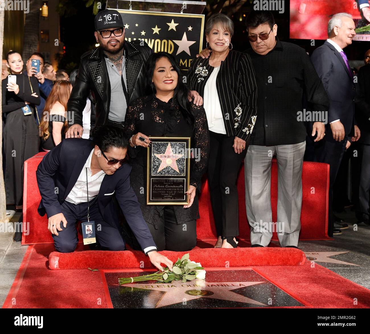 Chris Perez, bottom left, the former husband of the late singer Selena ...