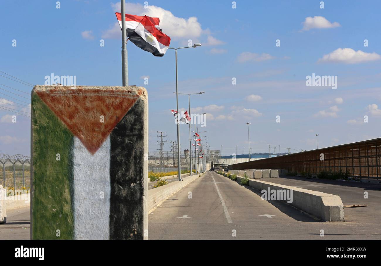 Egyptian flags fly at the passageway leading to Israeli at the ...