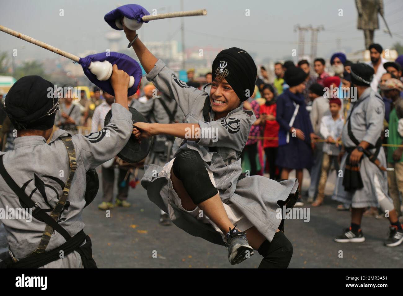 Indian Sikh warriors display traditional martial art skills during a ...