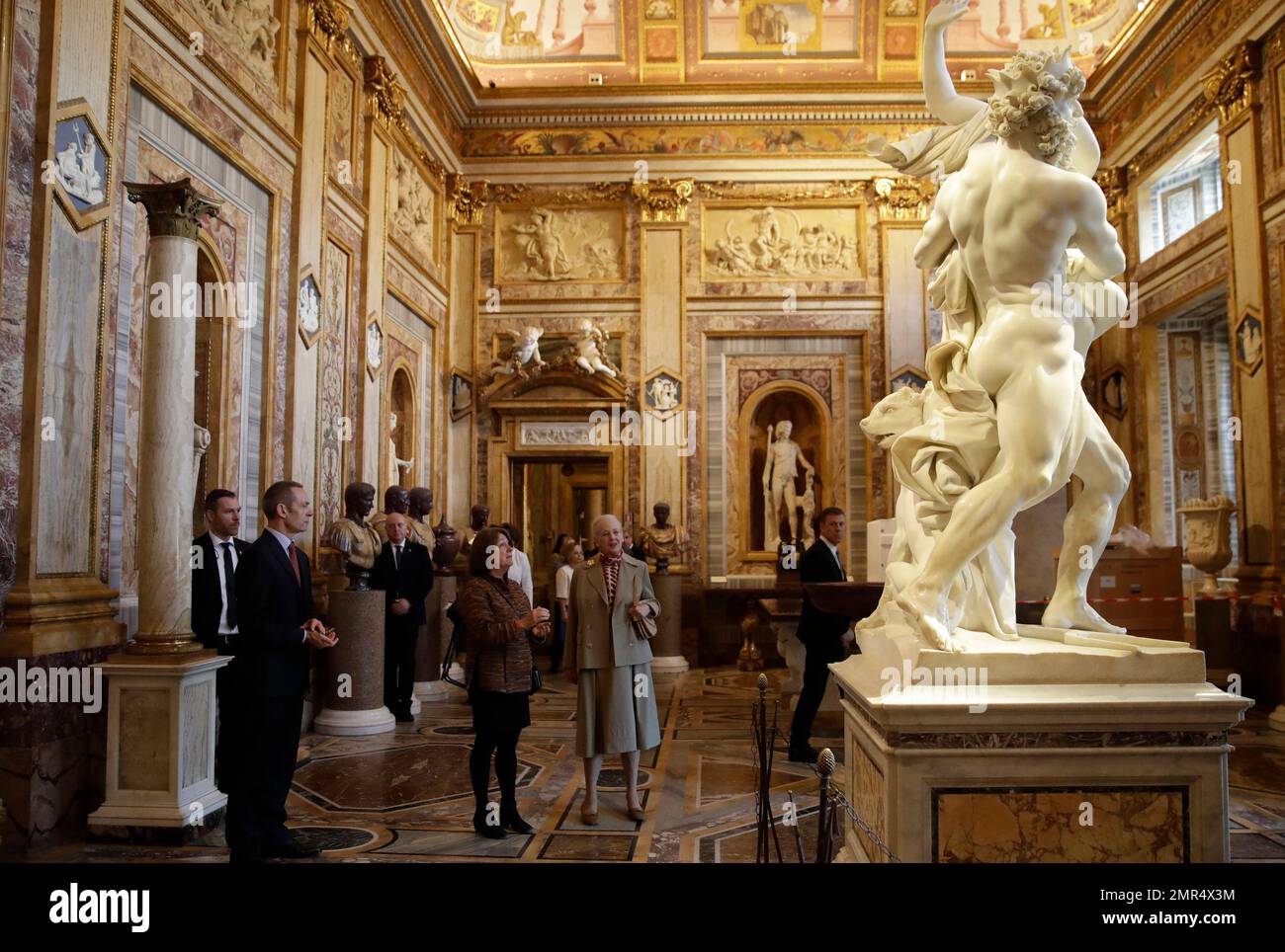 Danish Queen Margrethe, first from right, admires the "Il Ratto di ...