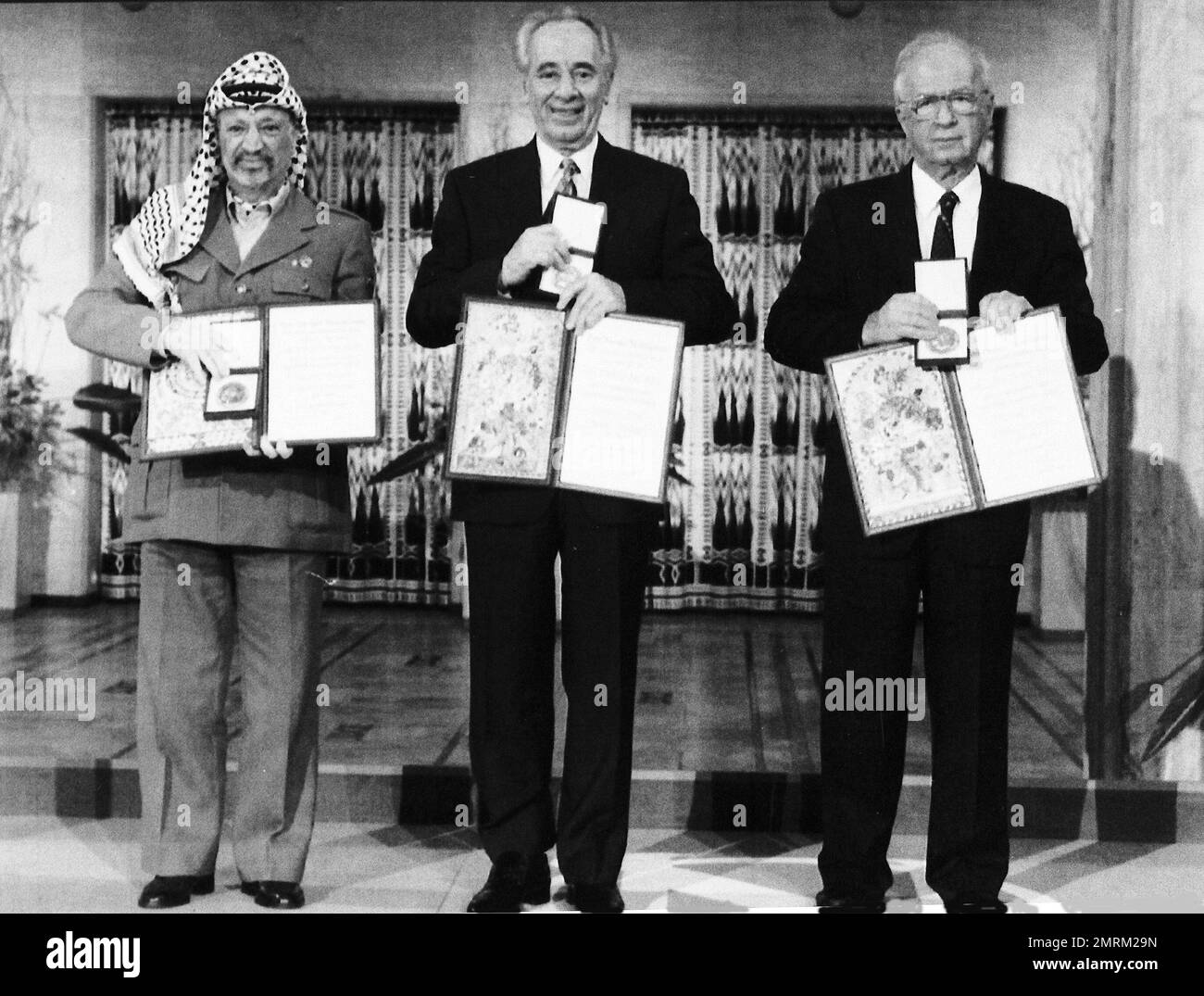 FILE - In this Dec. 10, 1994 file photo, PLO leader Yasser Arafat, left ...