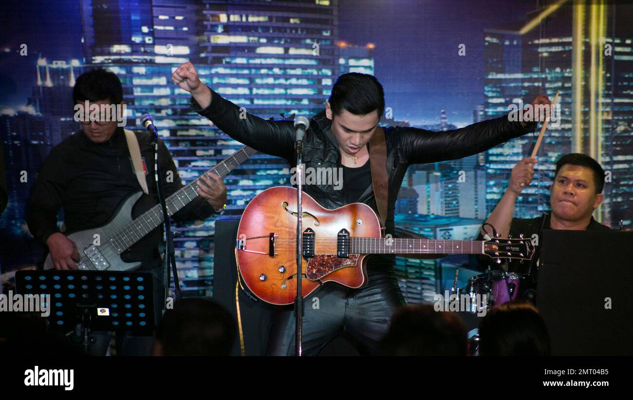 In this Aug. 10, 2017, photo, Elvis impersonator Bam Angping performs ...