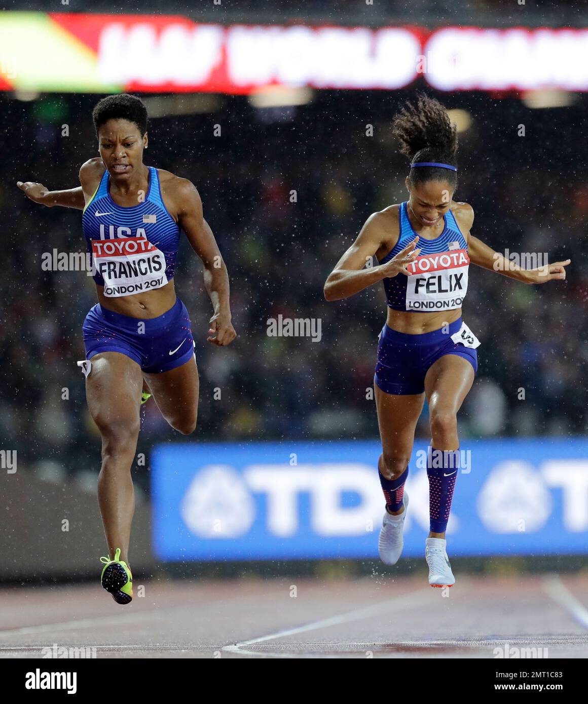 United States' Phyllis Francis, left, crosses the line to win the gold ...