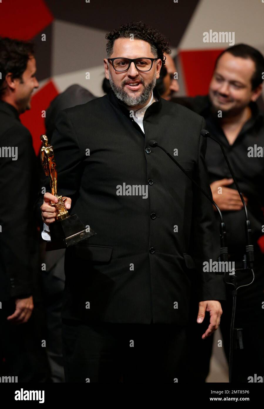 Amir Galvan, one of the directors of "La 4a compania" holds up the ...