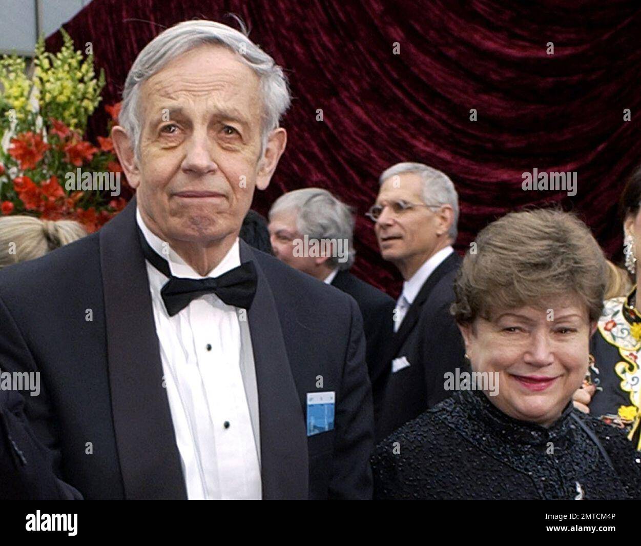 FILE - In this March 24, 2002 file photo, John Nash, left, and his wife ...