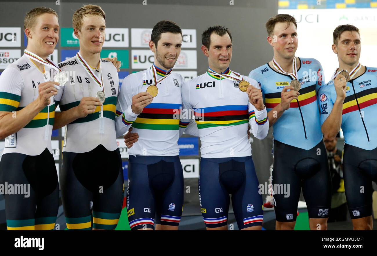 France's Morgan Kneisky and Benjamin Thomas stand on the centre of the ...