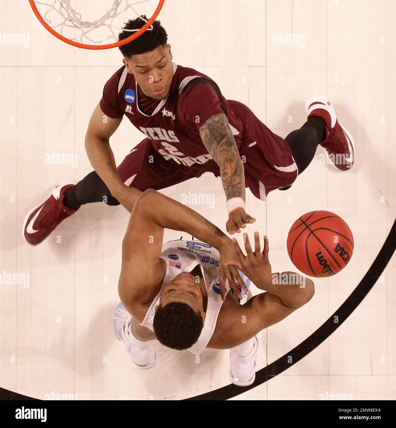 North Carolina's Kennedy Meeks (3) is fouled by Texas Southern's Zach ...
