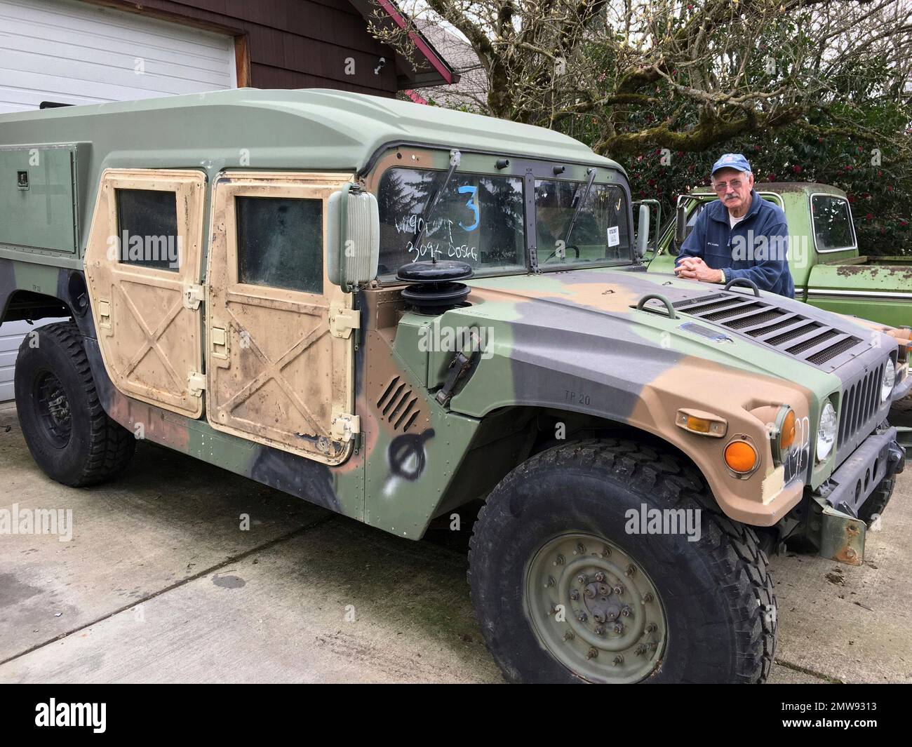 Hank Porter, 75, Mayor of Stayton, Ore., stands with his 1990 military ...