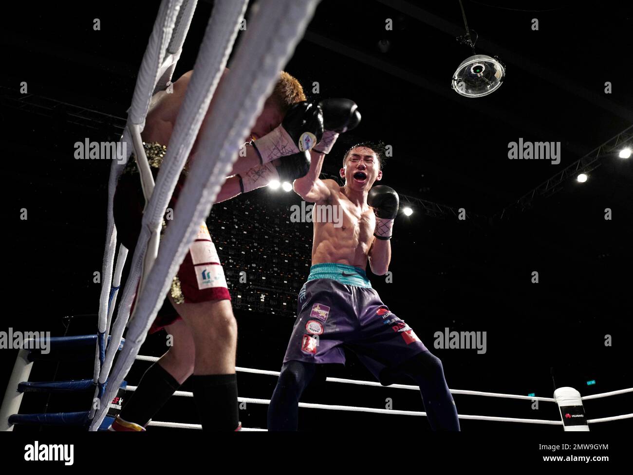 Hong Kong fighter Rex Tso, right, fights with Japanese fighter Hirofumi ...
