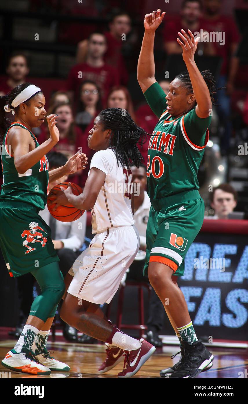 Florida State guard Imani Wright (32), center, is double-teamed by ...