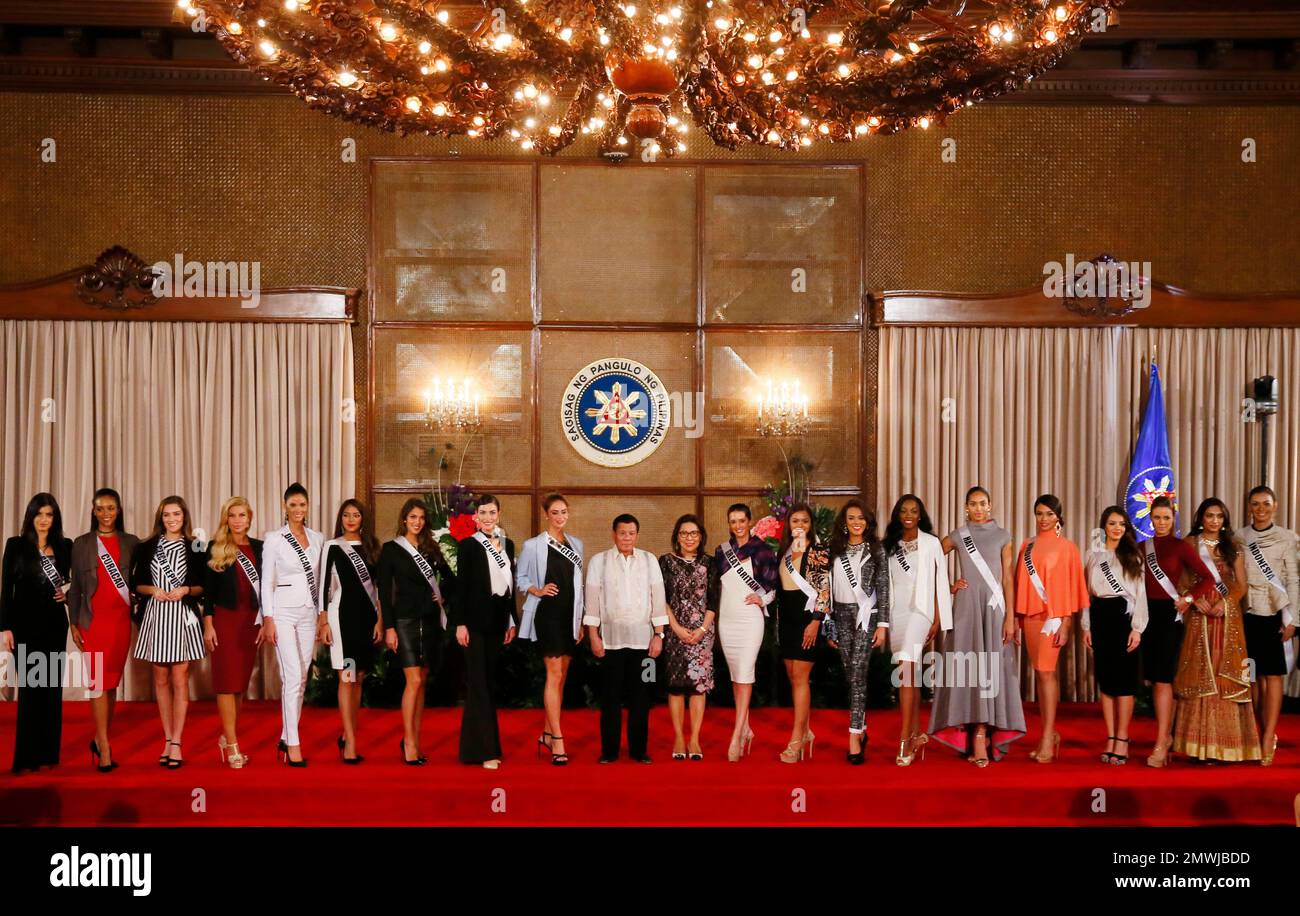 Philippine President Rodrigo Duterte, center, and Tourism Secretary ...