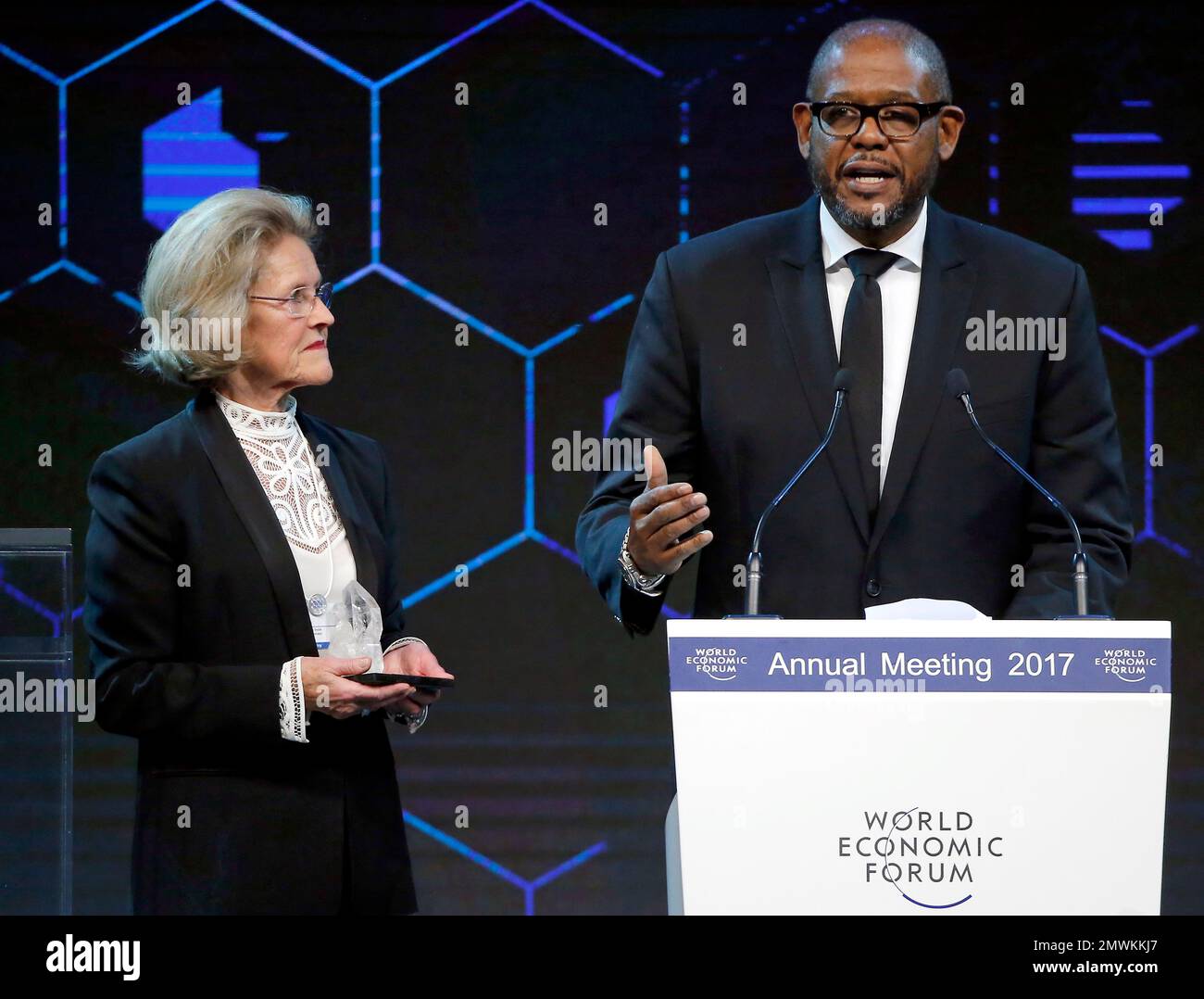 U.S. Actor and 'Crystal Award' winner Forest Whitaker, right, speaks ...
