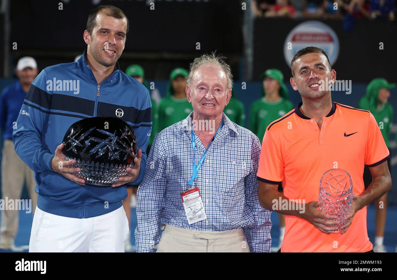 Gilles Muller of Luxembourg, left, and Britain's Daniel Evans, right ...