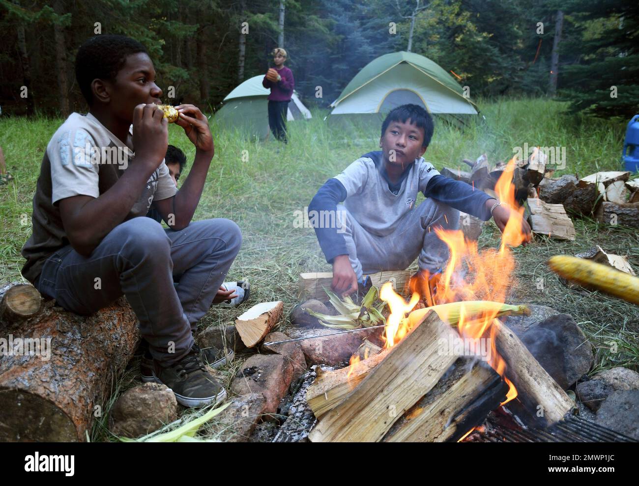 In this Sept. 10, 2016, photo, Justin Mbelechi, 13, and Bidesh Magar ...