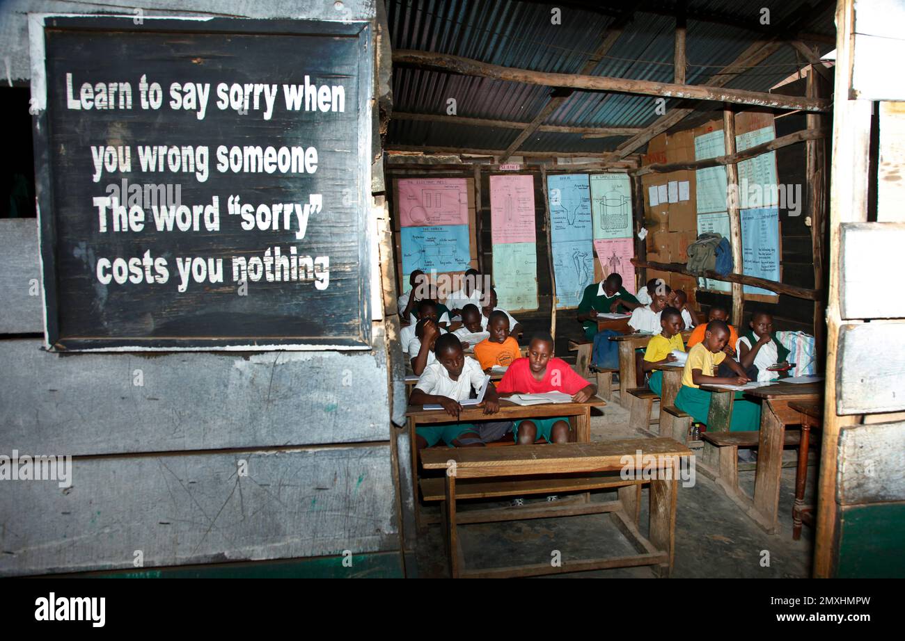 In this photo taken Friday, Oct. 14, 2016, pupils sit in a wood ...
